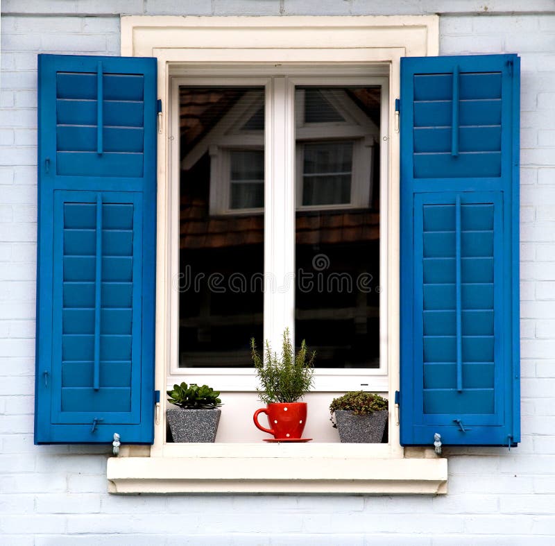 Blue Shutters and Red Pot stock image. Image of brick - 13063503