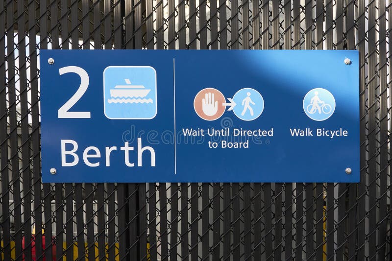 Blue Sign for Berth 2 Providing Passenger Information at a Ferry ...