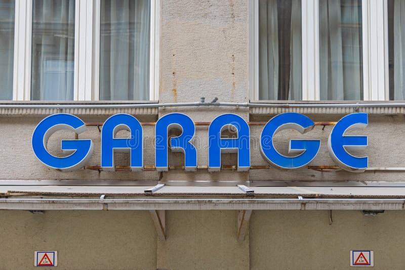 Blue Sign Garage stock image. Image of garage, structure - 244748645