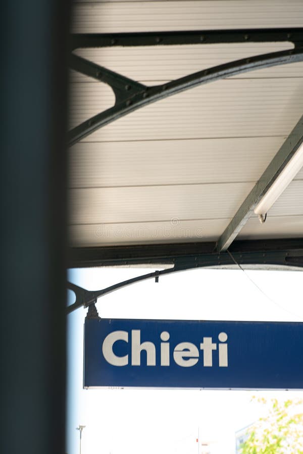 Blue Sign with White Text "Chieti" Hangs from a Metallic Structure ...