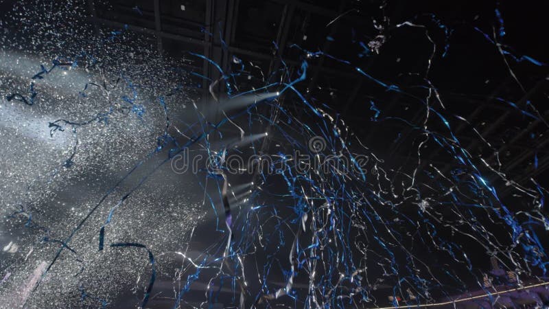 Blue and Silver Confetti Falling during a Concert or Event Stock Video ...