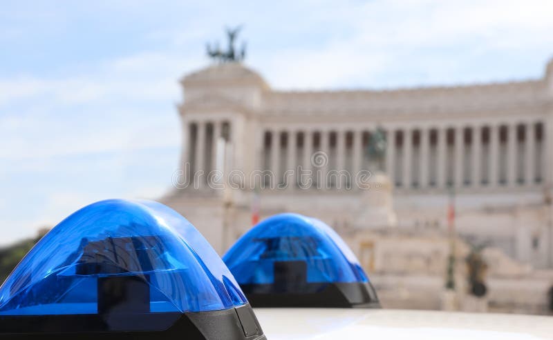 Blue Sirens of Police Car and the Ancient Monument without People Stock ...