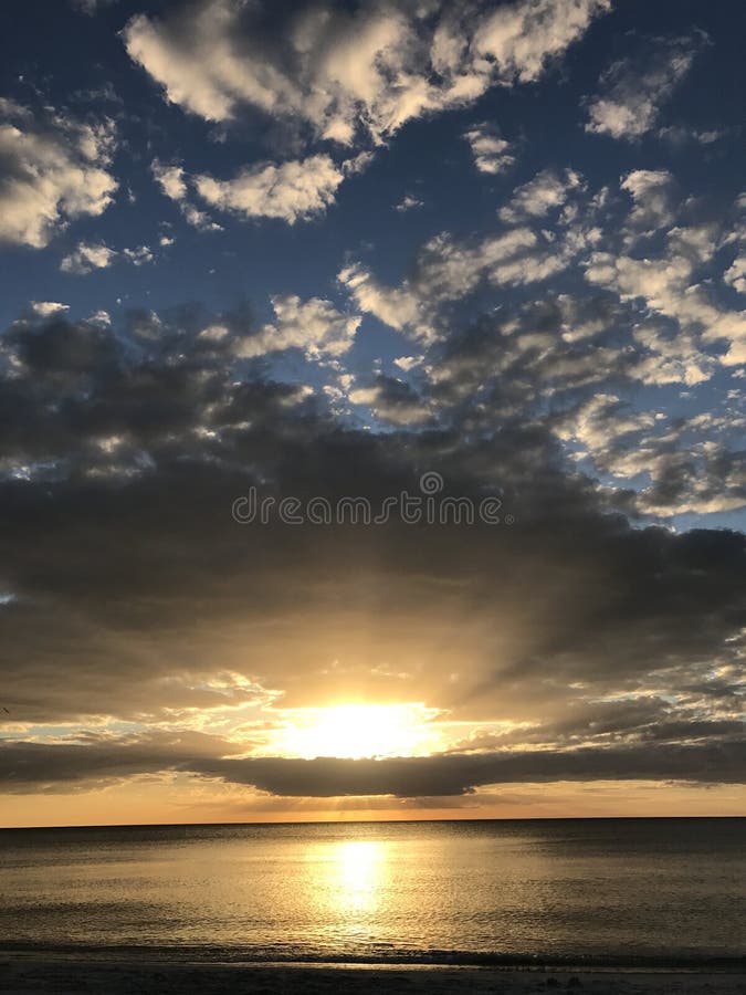 Blue Skies and a Bright Sunset Stock Photo - Image of tropical, sunset ...