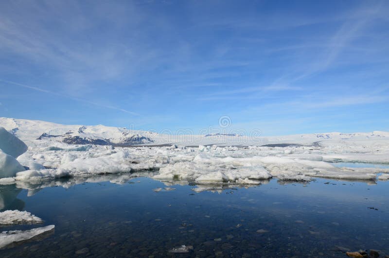 Blue Skies Over an Icey Landscape in Iceland Stock Photo - Image of ...