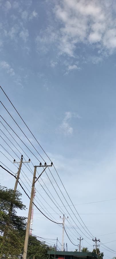 Blue Skies and Tall Electric Poles Stock Image - Image of electricity ...