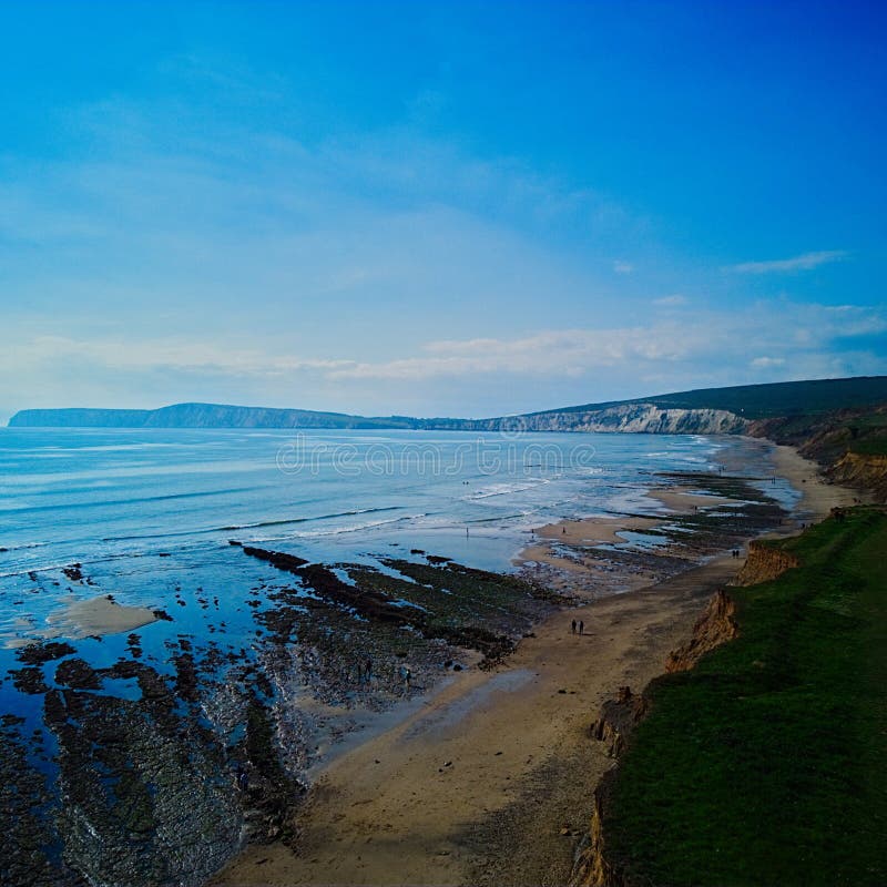 Blue Water Ocean Beach Muddy Cliffside Stock Image - Image of frame ...