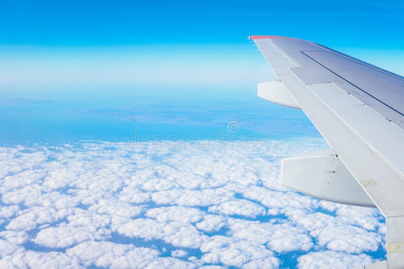 Blue Sky Above White Clouds from Inside the Plane Stock Image - Image ...
