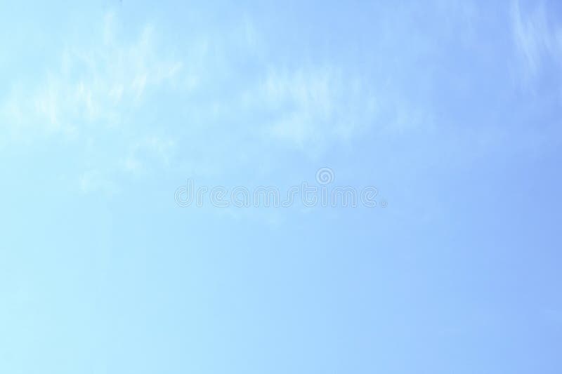 On a Blue Sky Background and Light Haze . Stock Image - Image of high ...