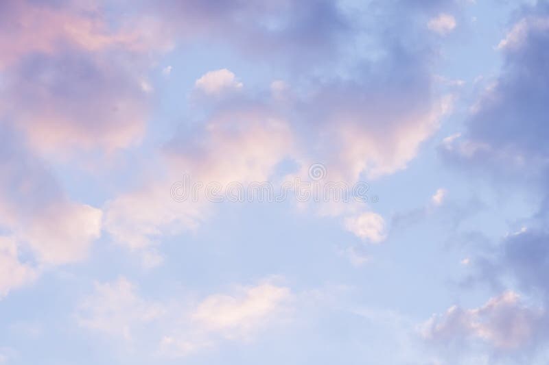 Blue Sky Background with Pale Pink Clouds at Sunset Stock Image - Image ...