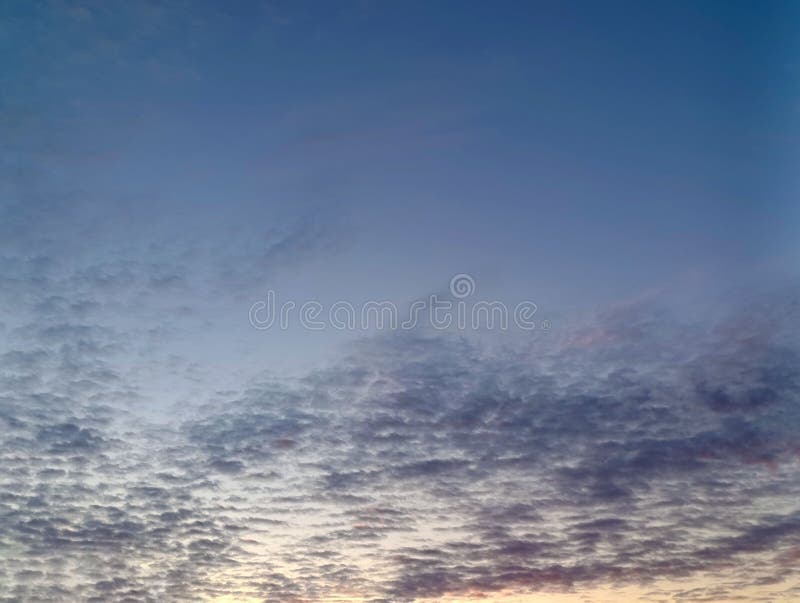 Blue Sky Background, Small Cumulus Dark Clouds Below Stock Photo - Image of light, color: 381428392