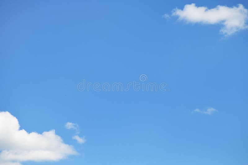 Blue Sky Background with Small White Clouds in Corners Stock Photo ...