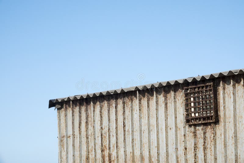 Blue Sky Behind a Rusty Facade. Stock Photo - Image of environment ...