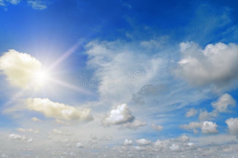 Couds In The Blue Sky. Bright Midday Sun Illuminates Space Stock Photo ...