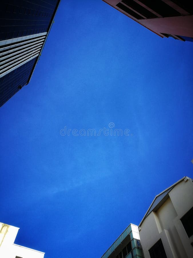 Blue sky stock photo. Image of white, tower, blue, building - 126827724