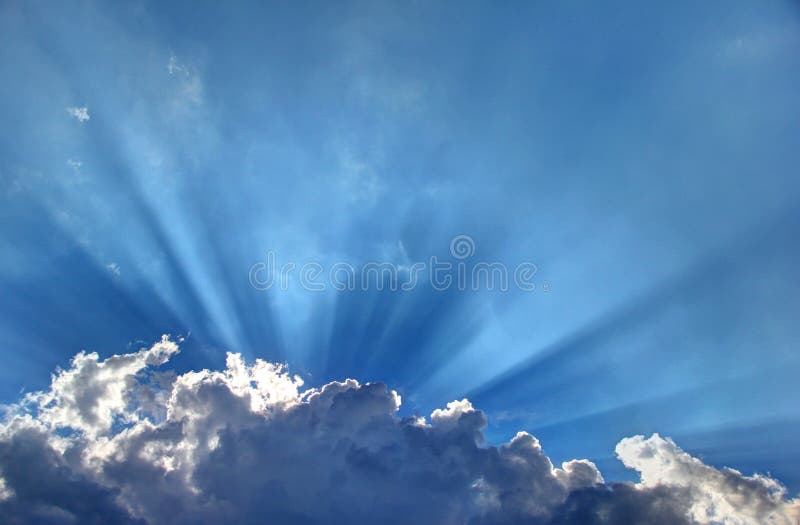 Blue Sky and Clouds with Rays of the Sun Stock Photo - Image of ...