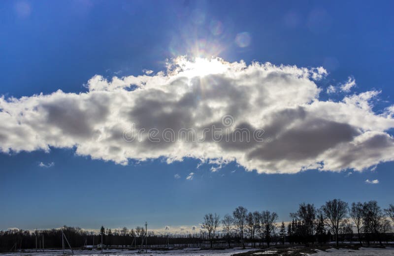 On a Blue Sky Clouds on a Diagonal Horizontal Sun Bright Glare Beams ...