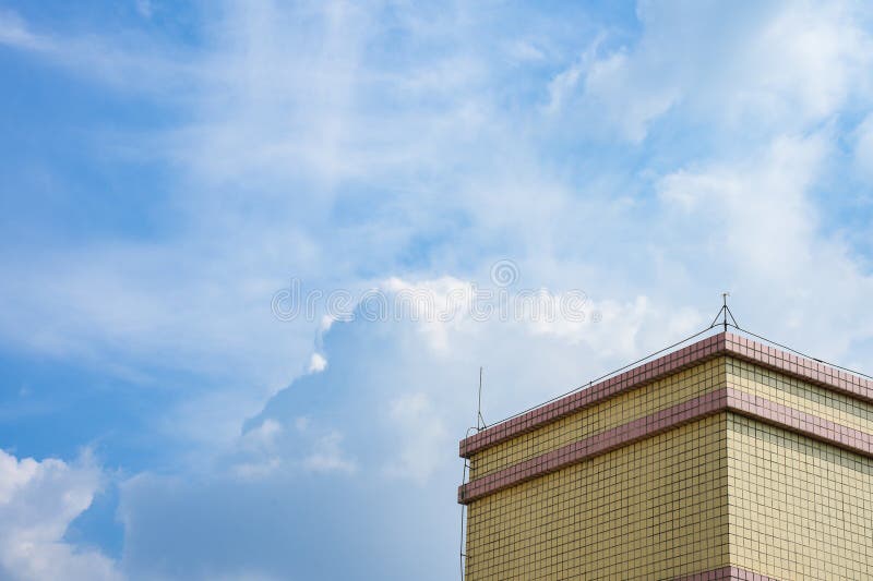 A Corner of a Building Under a Blue Sky. Stock Photo - Image of ...