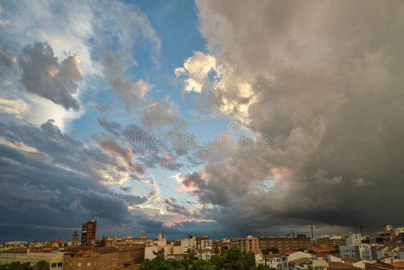 Blue Sky with Clouds Over the City Stock Image - Image of roofs, view ...