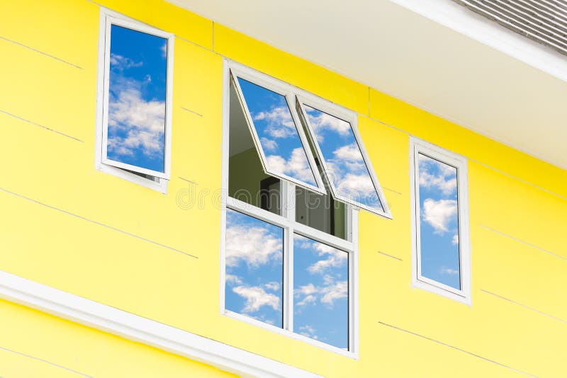 Blue Sky with Clouds Reflected in Glass Windows of Modern Office Stock ...