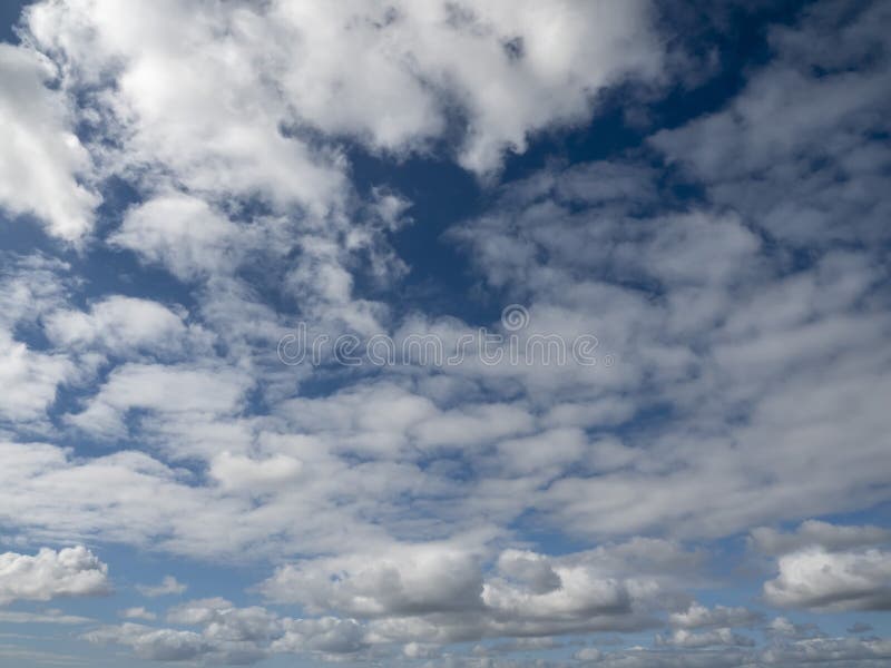 Blue Sky with Fluffy Clouds of Different Shapes. Nature Background for ...