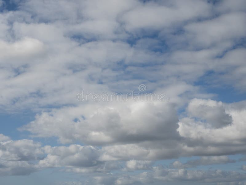 Blue Sky with Fluffy Clouds of Different Shapes. Nature Background for ...