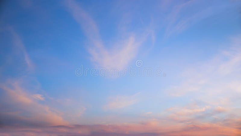 Blue Sky and Fluffy Pink Clouds at Sunset, Horizontal Format Stock ...