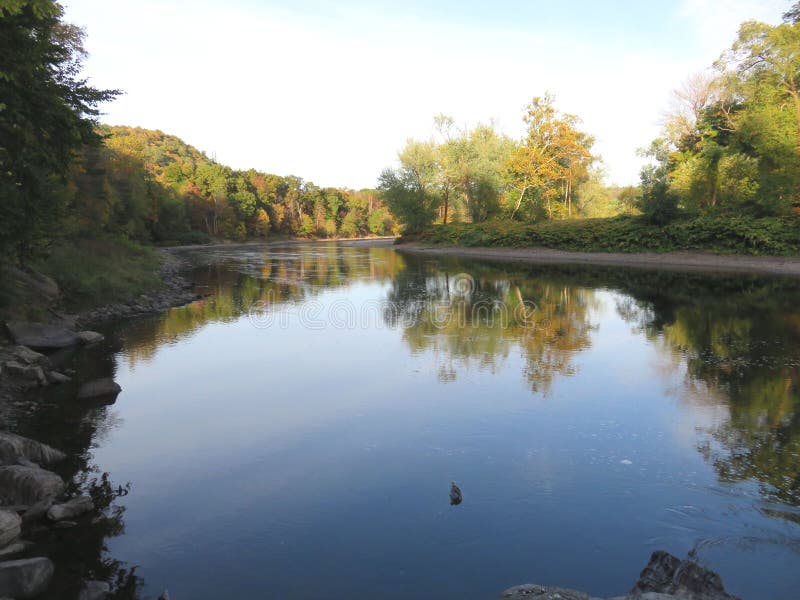 Sky and Trees Reflect into Calm River Stock Image - Image of autumn ...