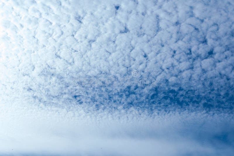 Cumulus Small Clouds with a Big Red Spot from a Sunset in the Summer ...
