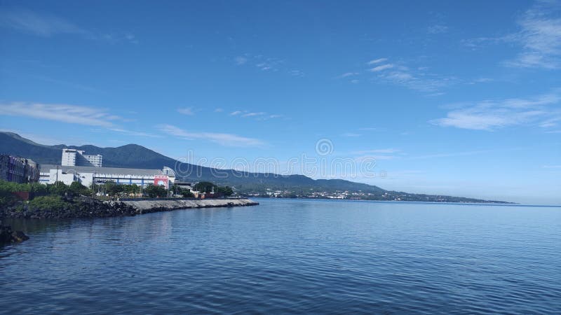 Blue Sky at Manado Beach stock photo. Image of manado - 261630444
