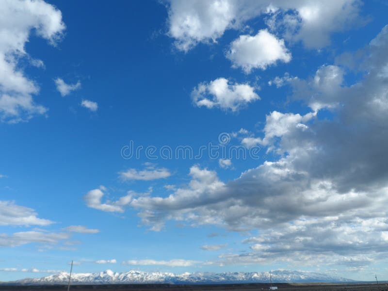 Blue Sky and a Mix of Clouds Stock Image - Image of clouds, sunshine ...
