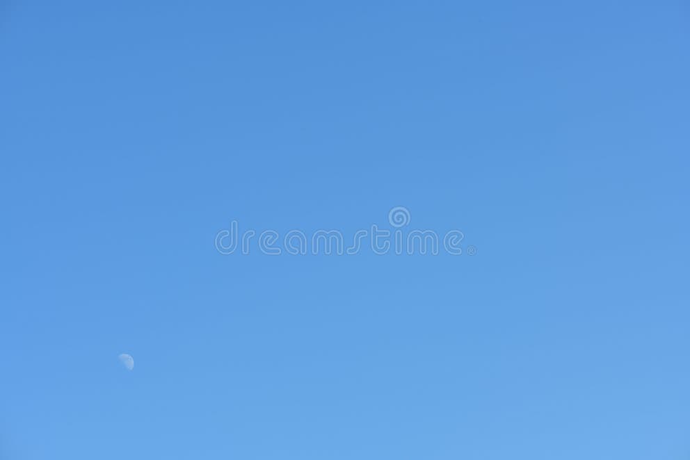 Blue Sky with Moon in the Corner Stock Image - Image of skyline, moon ...