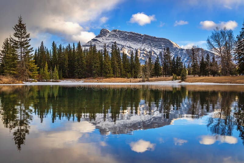 Blue Sky Mountain Reflections on a Banff Park Lake Stock Image - Image ...