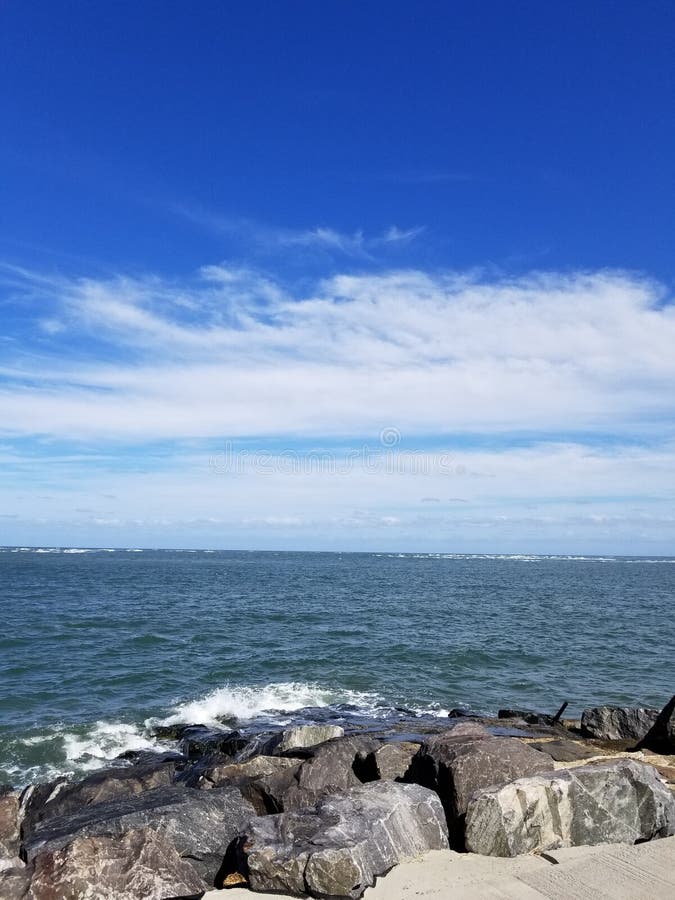 Blue sky stock photo. Image of ocean, rocks, view, blue - 121449036