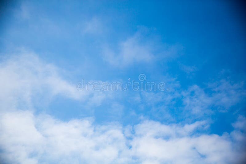 The Blue Sky, the Pale Clouds, the Shallow Moon. Stock Photo - Image of ...