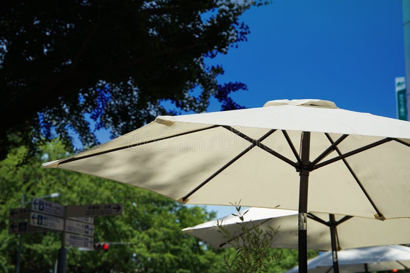 A blue sky and parasol stock photo. Image of spectacle - 102259498