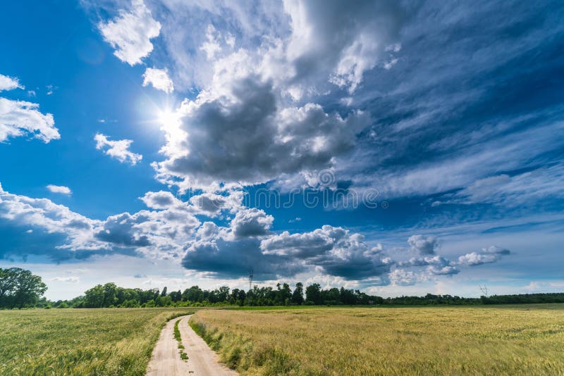 Blue Sky Partly Cloudy Over the Vast Plain. Stock Image - Image of ...