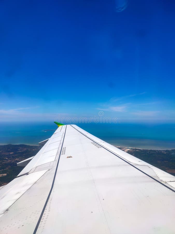 Blue Sky in the Photo from Inside the Plane Stock Photo - Image of ...
