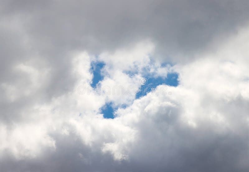 Blue sky in rain clouds stock image. Image of clouds - 184176859
