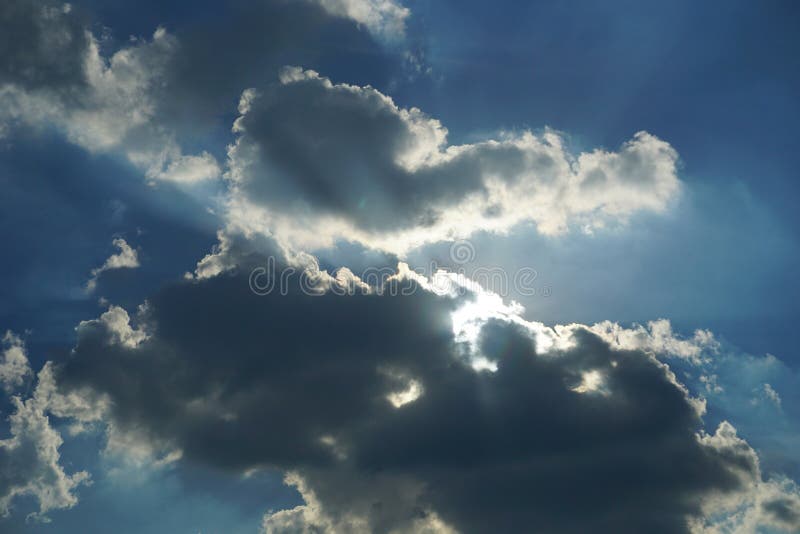 Blue sky with rain clouds stock image. Image of clouds - 130981941