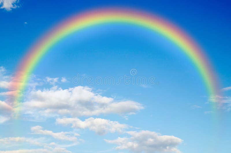 Rainbow in blue sky stock photo. Image of space, bright - 180605402