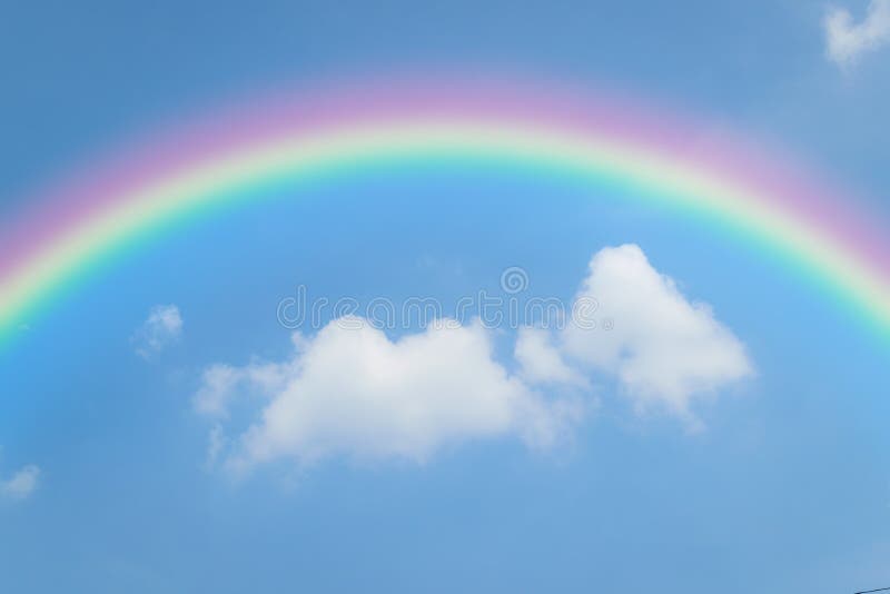 Blue sky with rainbow stock image. Image of outdoor, sunbeam - 56046985