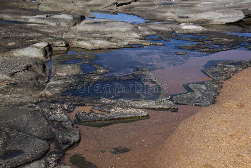 Blue Sky Reflected in Rock Pools at Seaside Stock Image - Image of ...