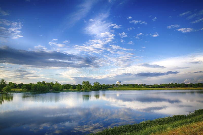 Blue sky reflection stock image. Image of trees, blue - 148908499