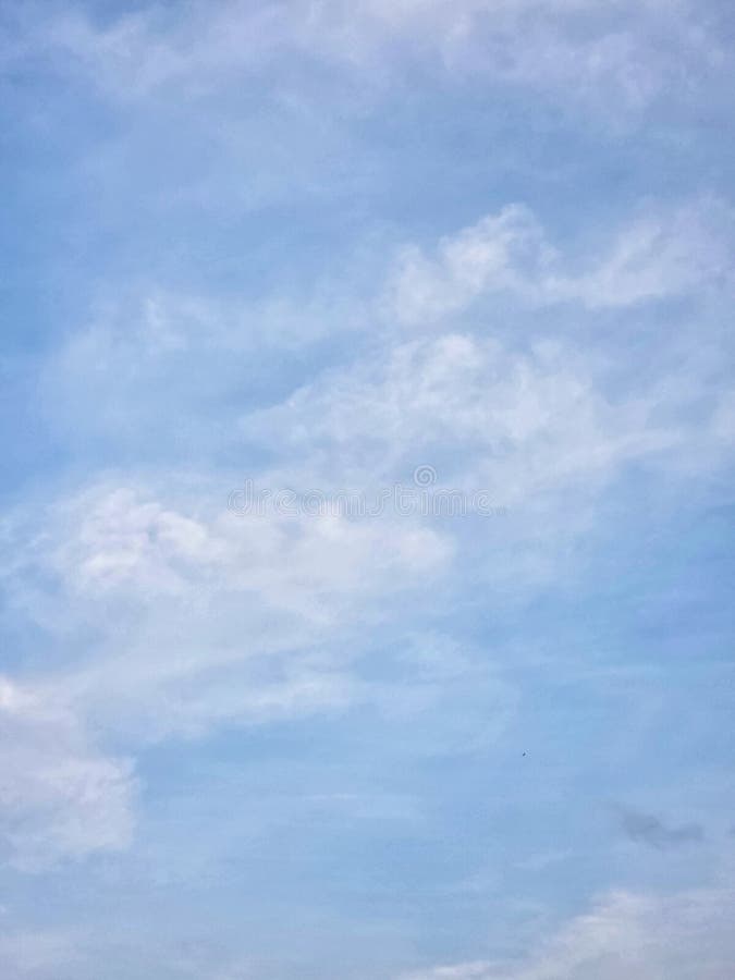 Blue Sky with Scattered White Clouds on Bright Sunny Day Stock Photo ...