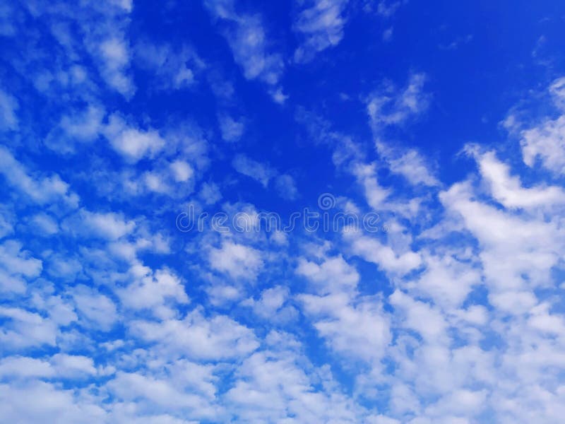 Blue Sky with Scattered White Clouds in the Morning Stock Photo - Image ...