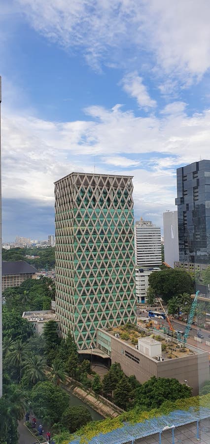 Blue Sky Scraper Building in Jakarta Editorial Image - Image of plant ...