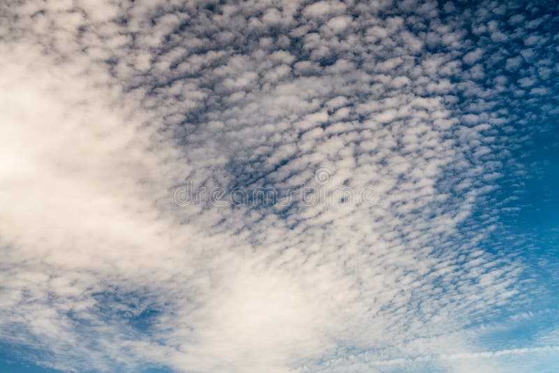 Blue sky with small clouds stock photo. Image of cloudy - 101772330