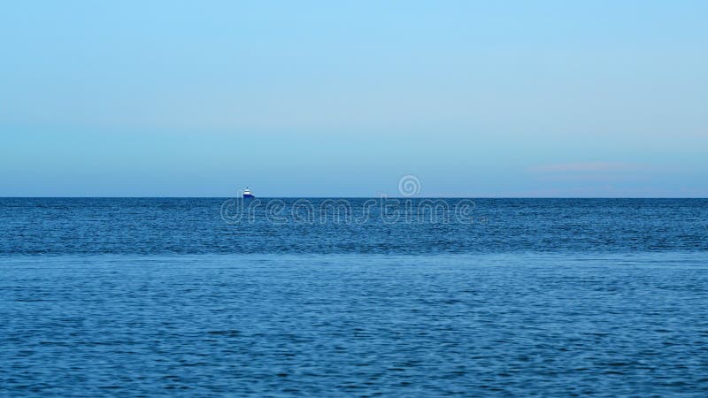 Blue Sky and Small Smooth Waves. Dramatic Landscape Clouds Above the ...
