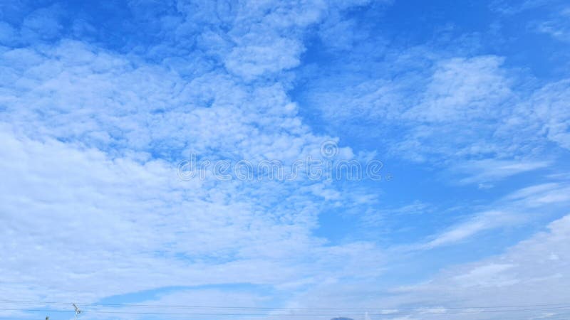 Blue Sky with Some Clouds Blown by the Wind into a Beautiful Shale ...