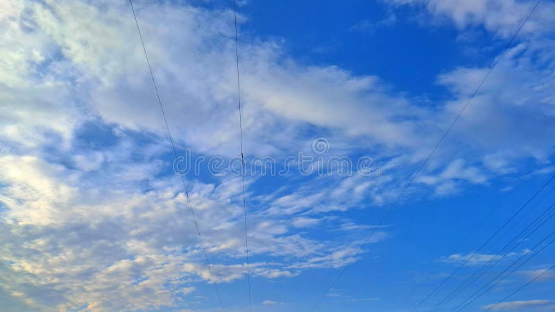 Blue Sky with Some Clouds Blown by the Wind into a Beautiful Shape ...